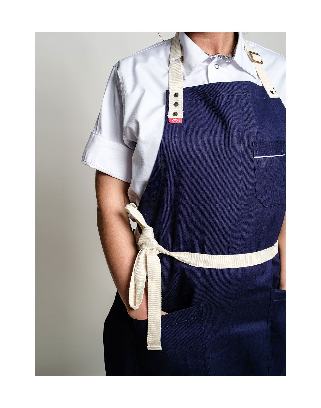 Dark blue apron chef- design restaurant