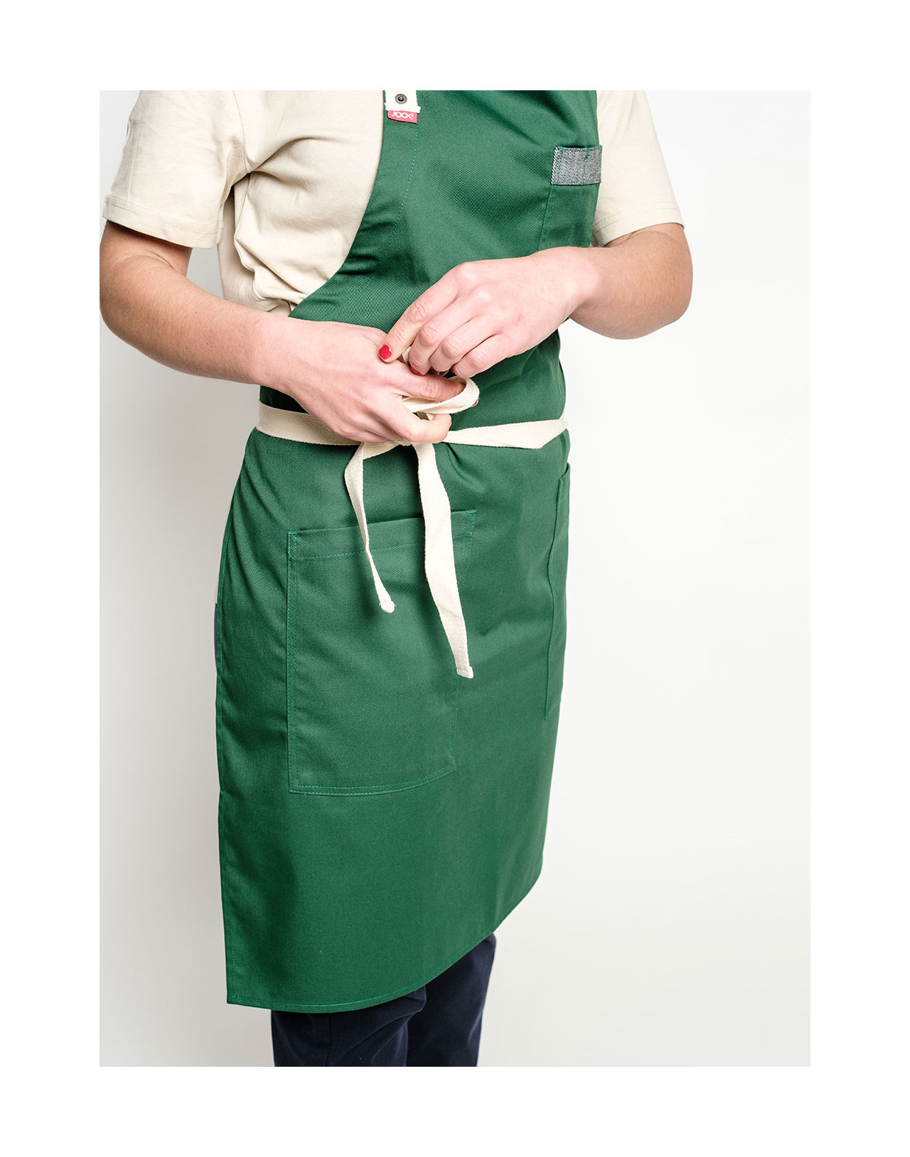 Green chef apron with white straps